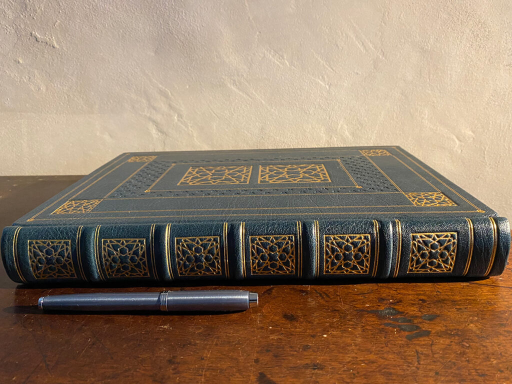 Large green leather journal / writing book with decorative gold tooling ...