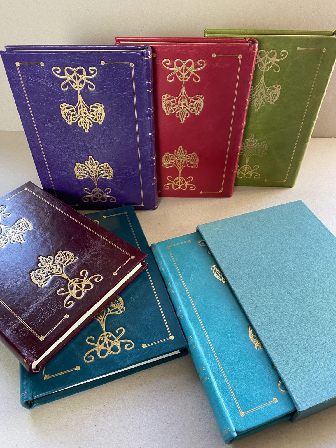 Large green leather journal / writing book with decorative gold tooling ...